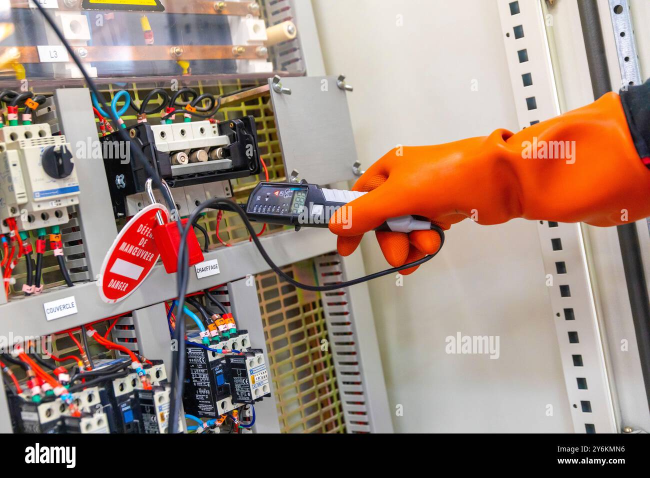 Electrician testing an electrical panel Stock Photo - Alamy