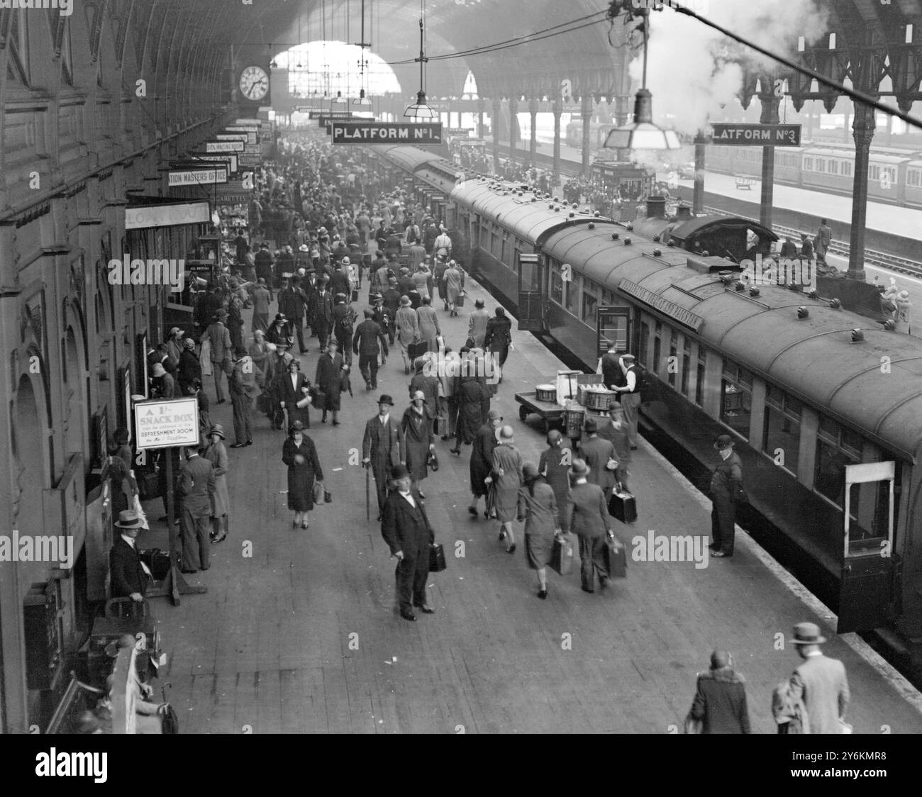 Crowded platforms at Paddington Station. 31 July 1931 © TopFoto Stock ...