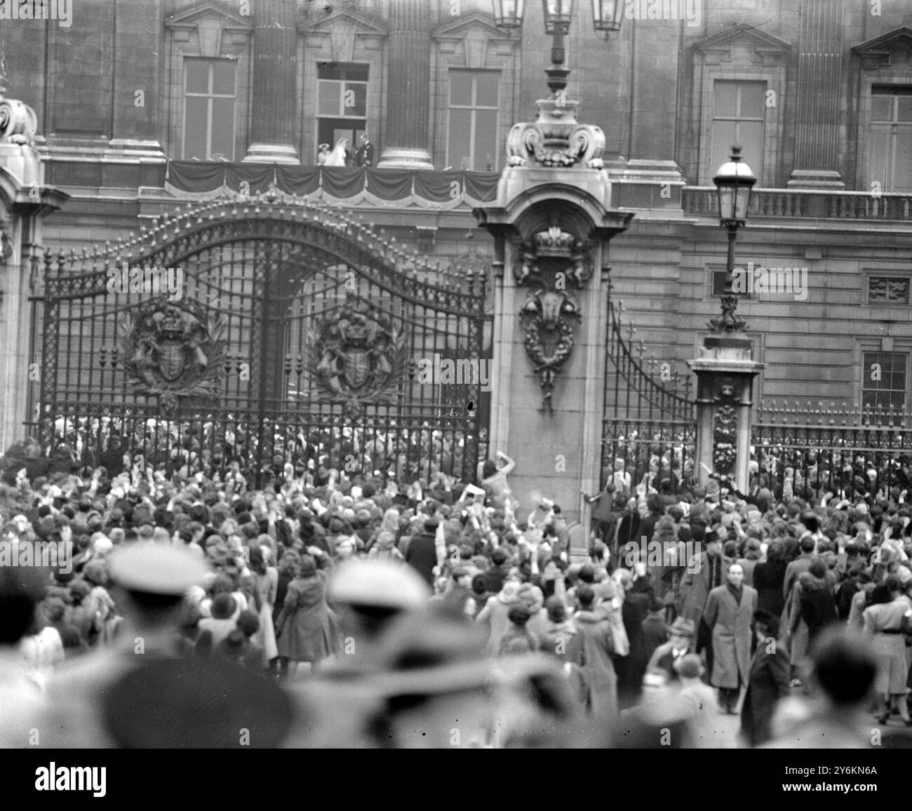 Royal Wedding. H.R.H Princess Elizabeth and Duke of Edinburgh. Crowds cheering the Royal Couple ...