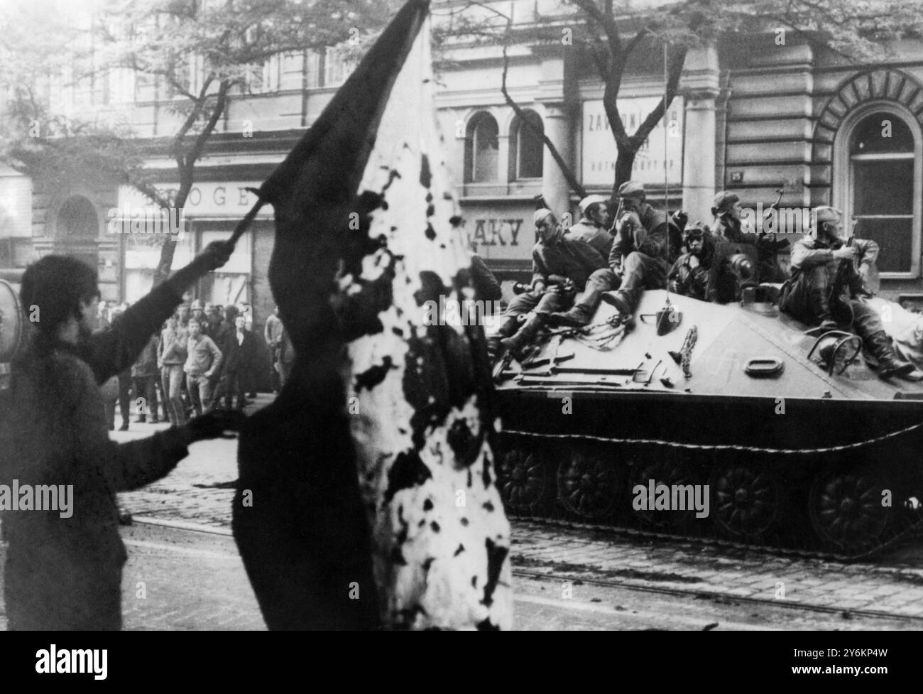 Prague Spring 1968 A Czechoslovakian youth holds a bloodstained flag ...