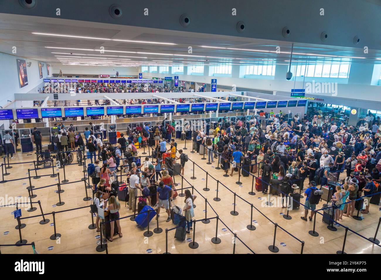 Several passengers standing in queue hi-res stock photography and images - Alamy