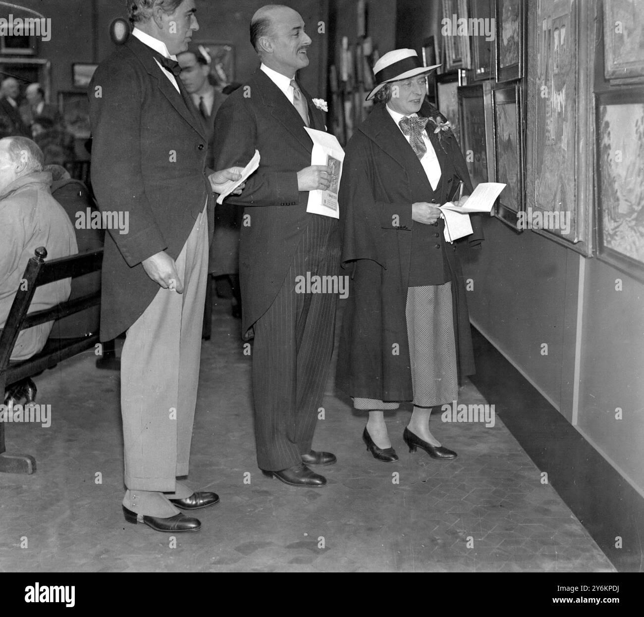 Dame Laura Knight inspecting some of the work after opening the Civil ...