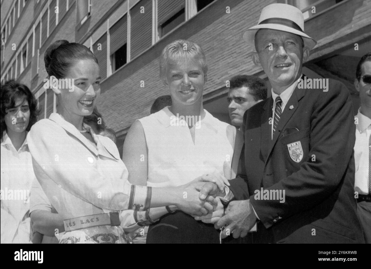 Rome: Crooner Bing Crosby has a three way handshake with Kathy Crosby ...