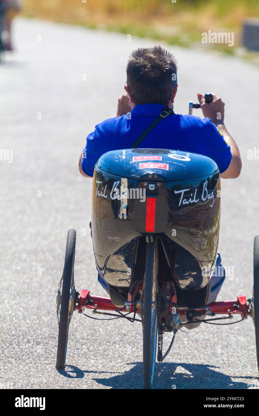 Streamlined arm tricycle bike seen from behind Stock Photo - Alamy