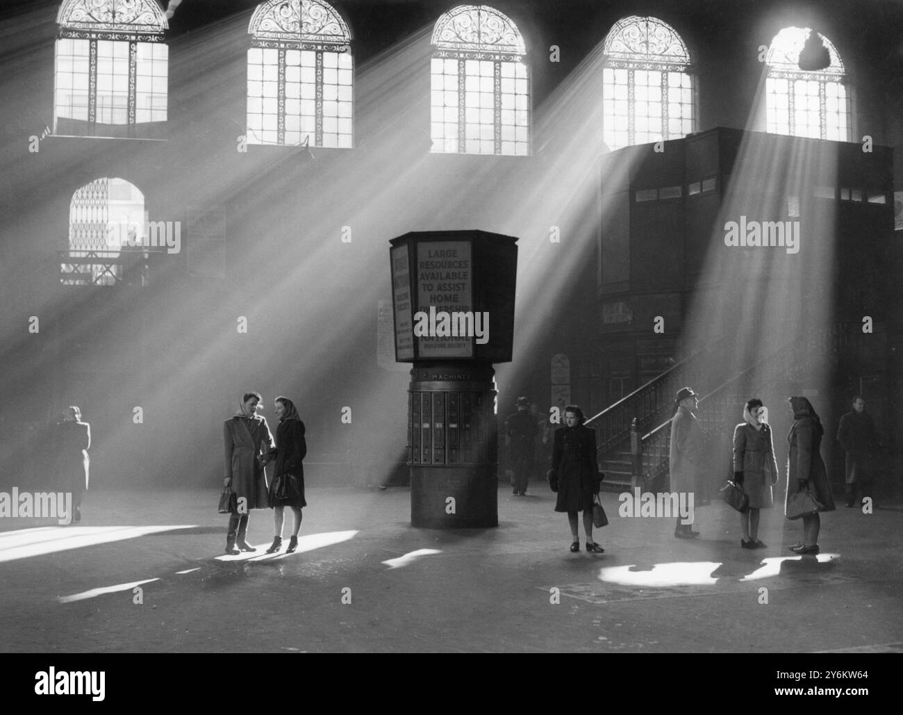 Liverpool Street Station - sun streaking through glass roof and windows ...