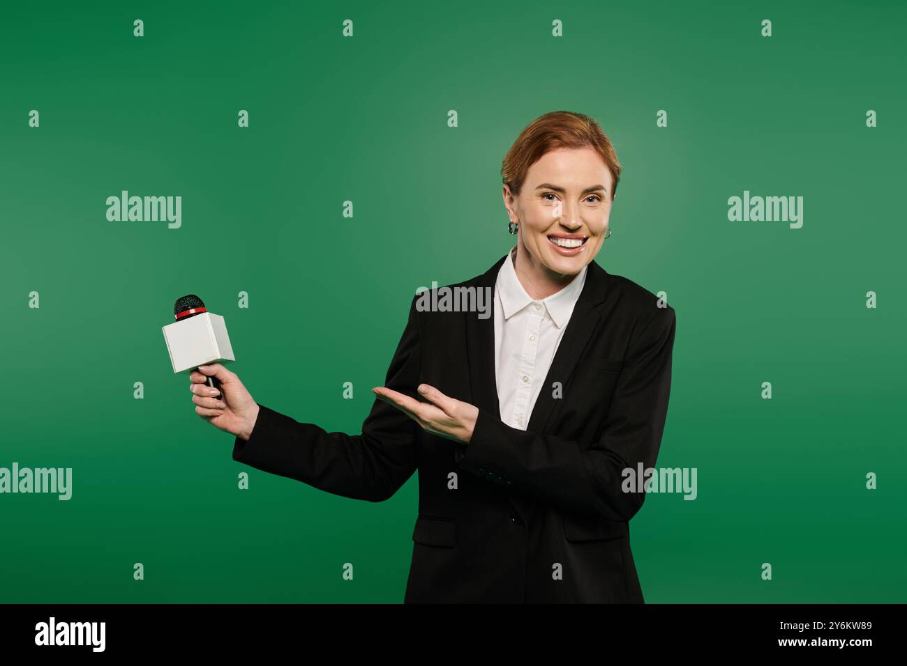 A confident presenter in black formal wear invites viewers to connect ...