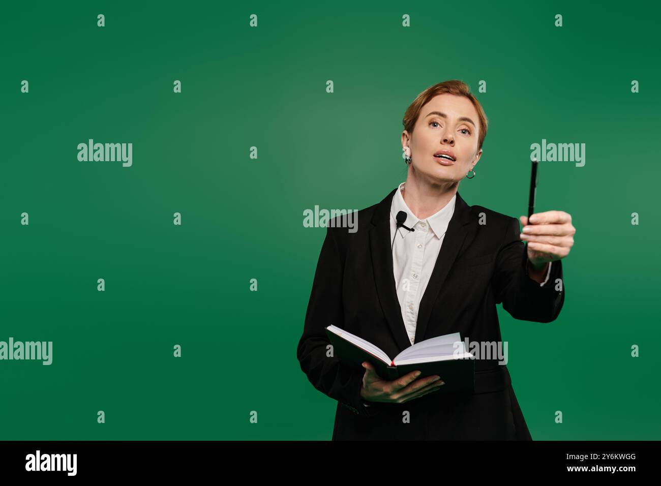 The TV presenter captivates her audience in stylish black attire while ...