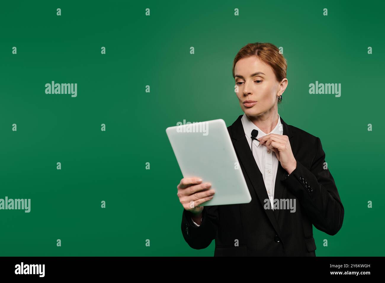The presenter in elegant black formal attire interacts with viewers ...