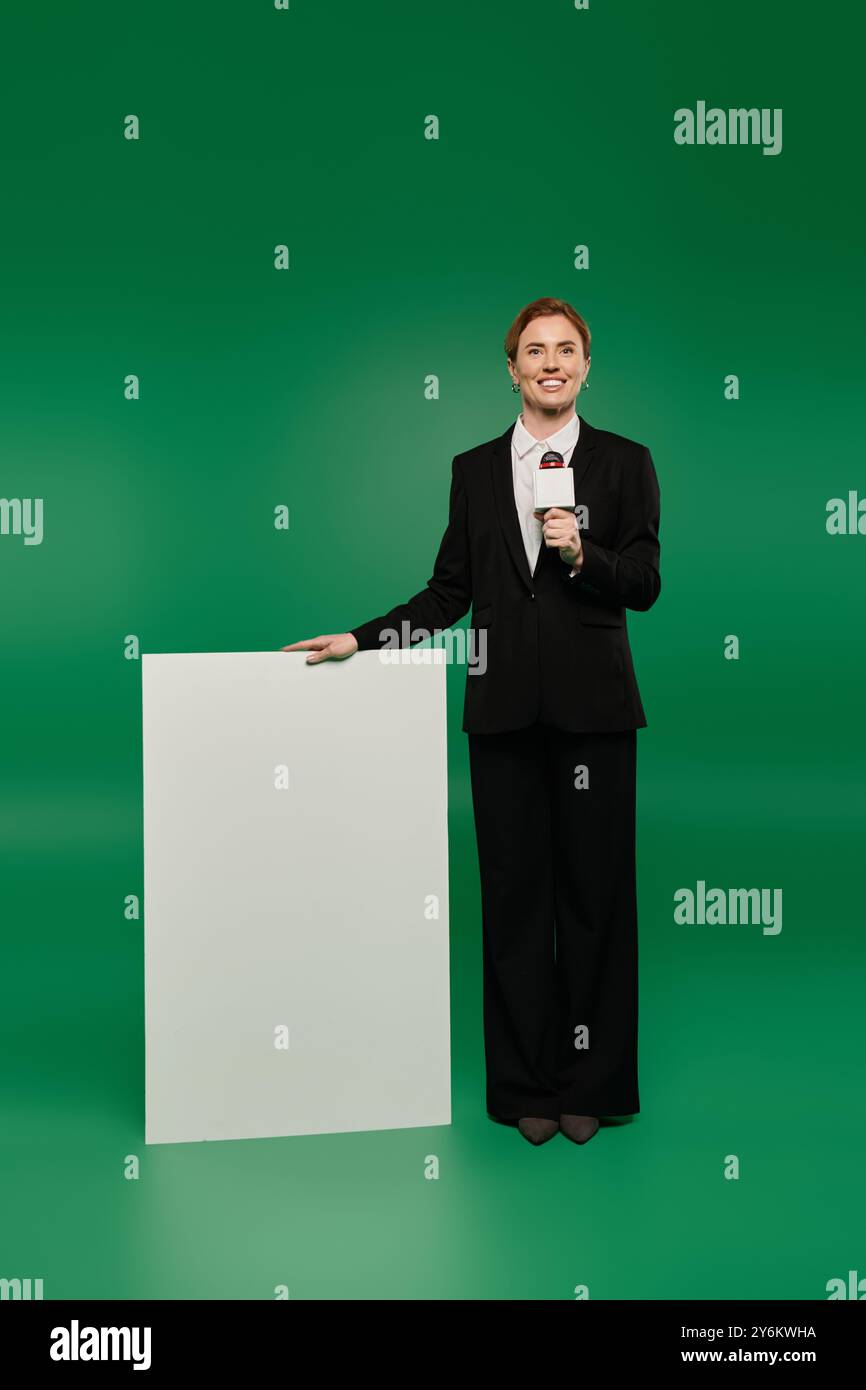 The TV presenter showcases professionalism in black attire, poised ...
