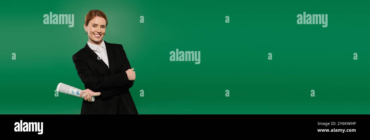 A poised presenter wearing black formal attire stands against a vibrant ...