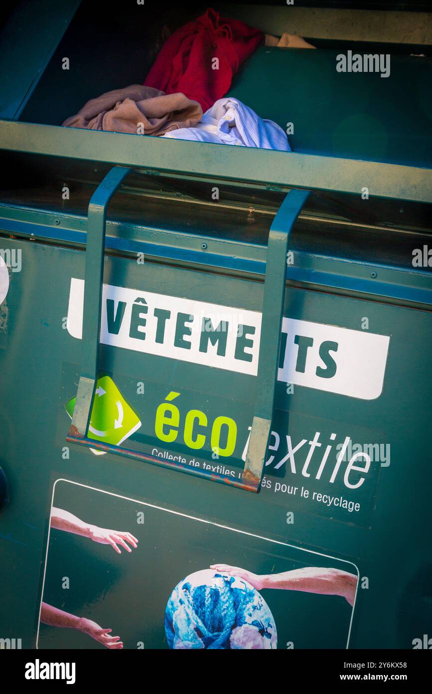 Clothing collection container Stock Photo - Alamy