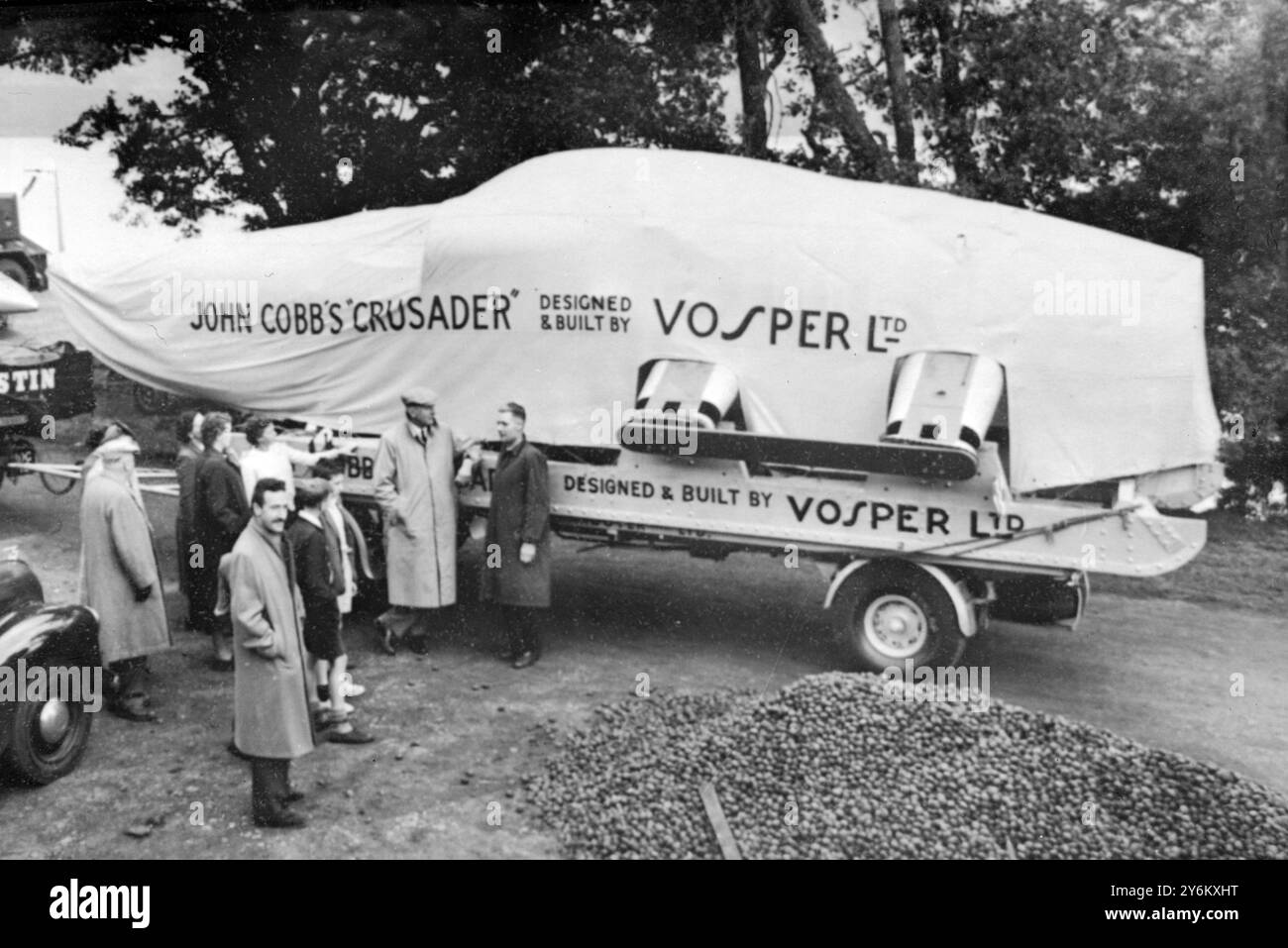 John Cobb with his elbow on the lorry, is the holder of the World land ...