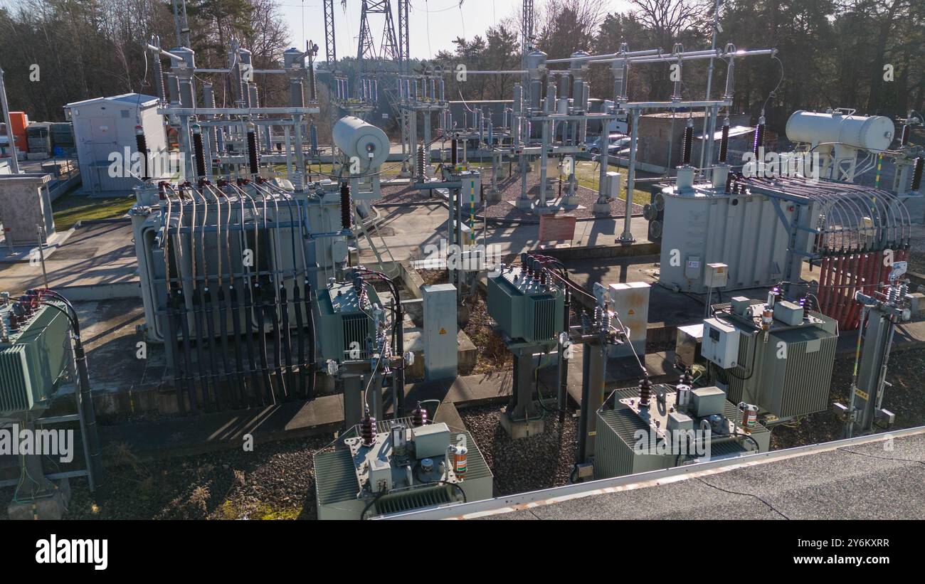 An industrial electrical substation featuring various transformers ...