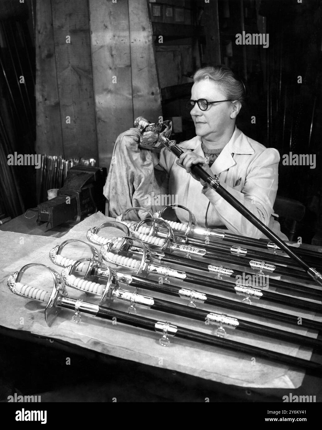 Sword cutters are busy making officers ceremonial swords or ...