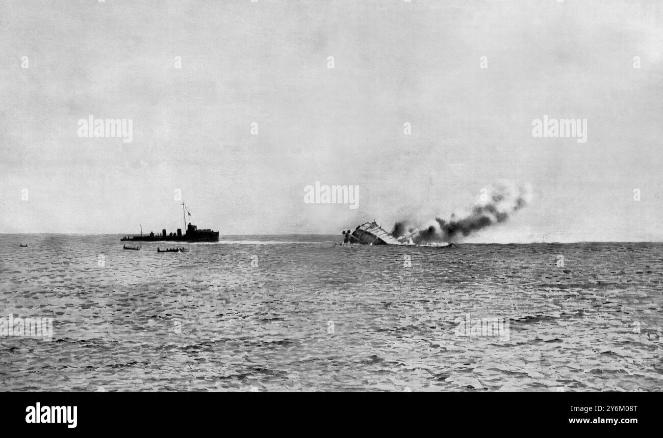 The German light cruiser "Mainz" going down while a British destroyer ...