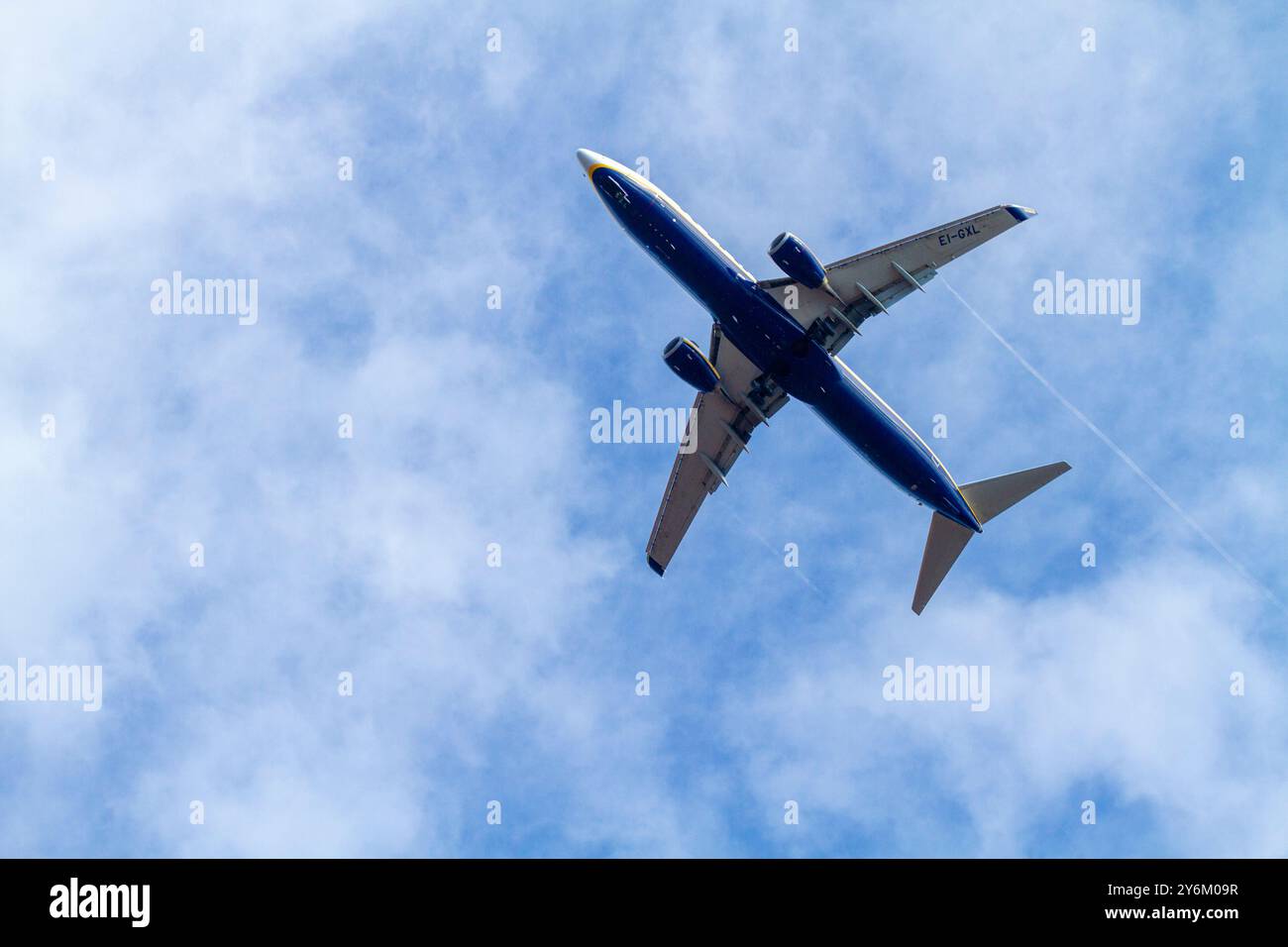 Ryanair Airplane underside in the sky Stock Photo - Alamy