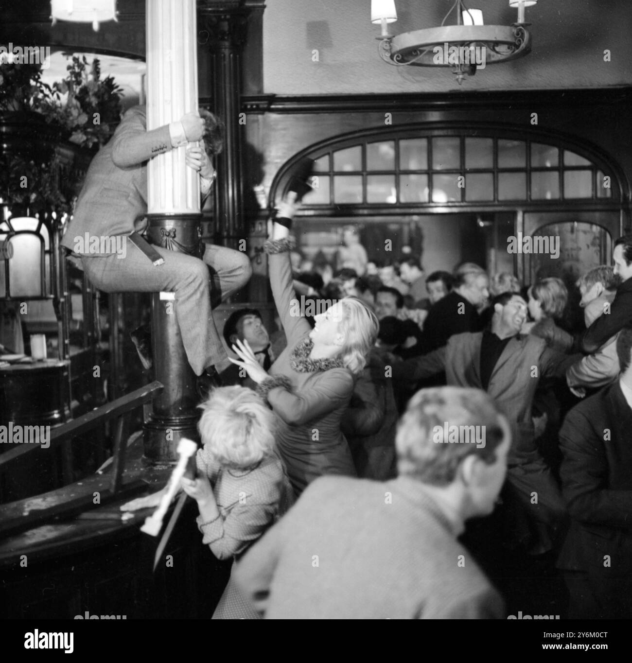 London: The girls turn on Caine. he tries to climb the post, but doesn ...