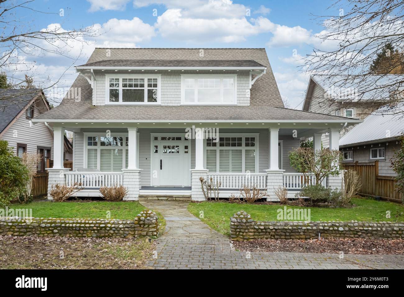 Old farm house with blue sky in the back ground. Old house exterior ...