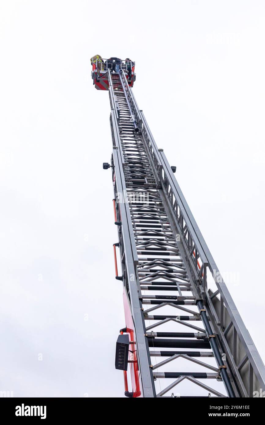 Germany, fire equipment. Large ladder deployed in the sky Stock Photo ...