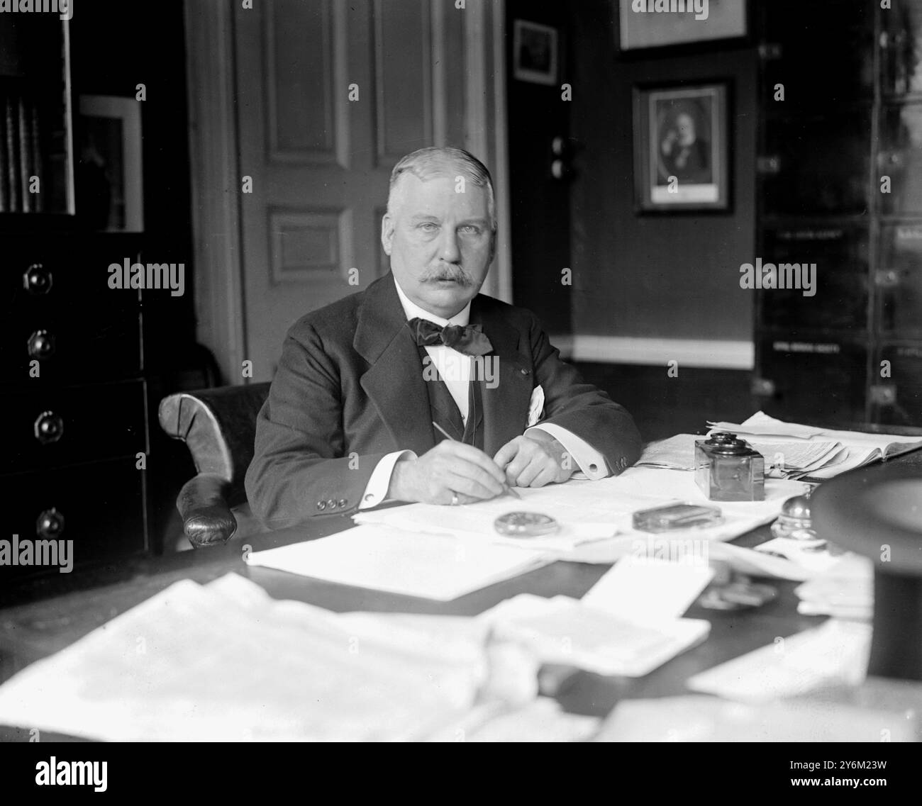 Sir William Dunn. Posing at a desk Stock Photo - Alamy