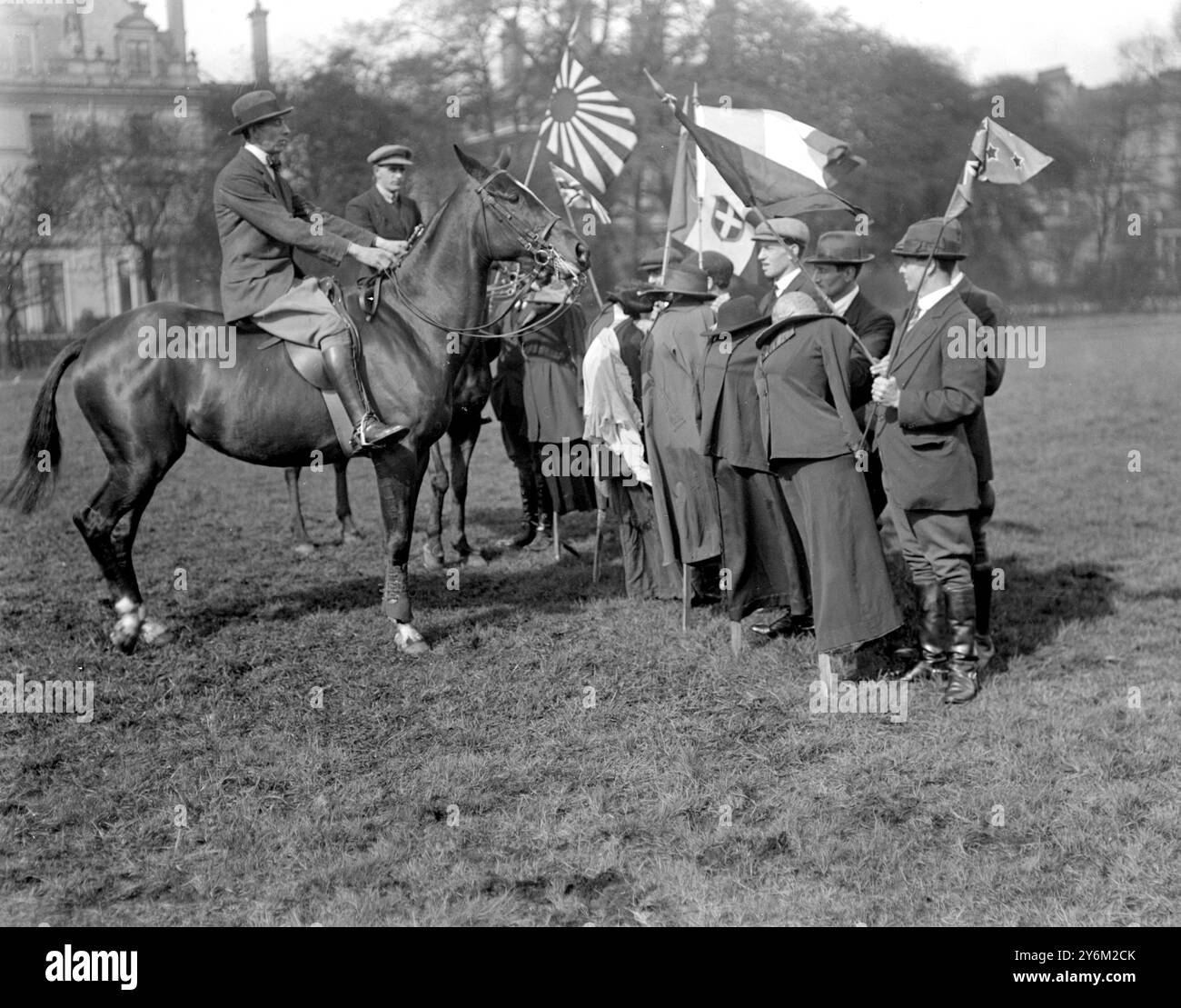 Training horses for Mounted Police work in London. Includes the flag ...