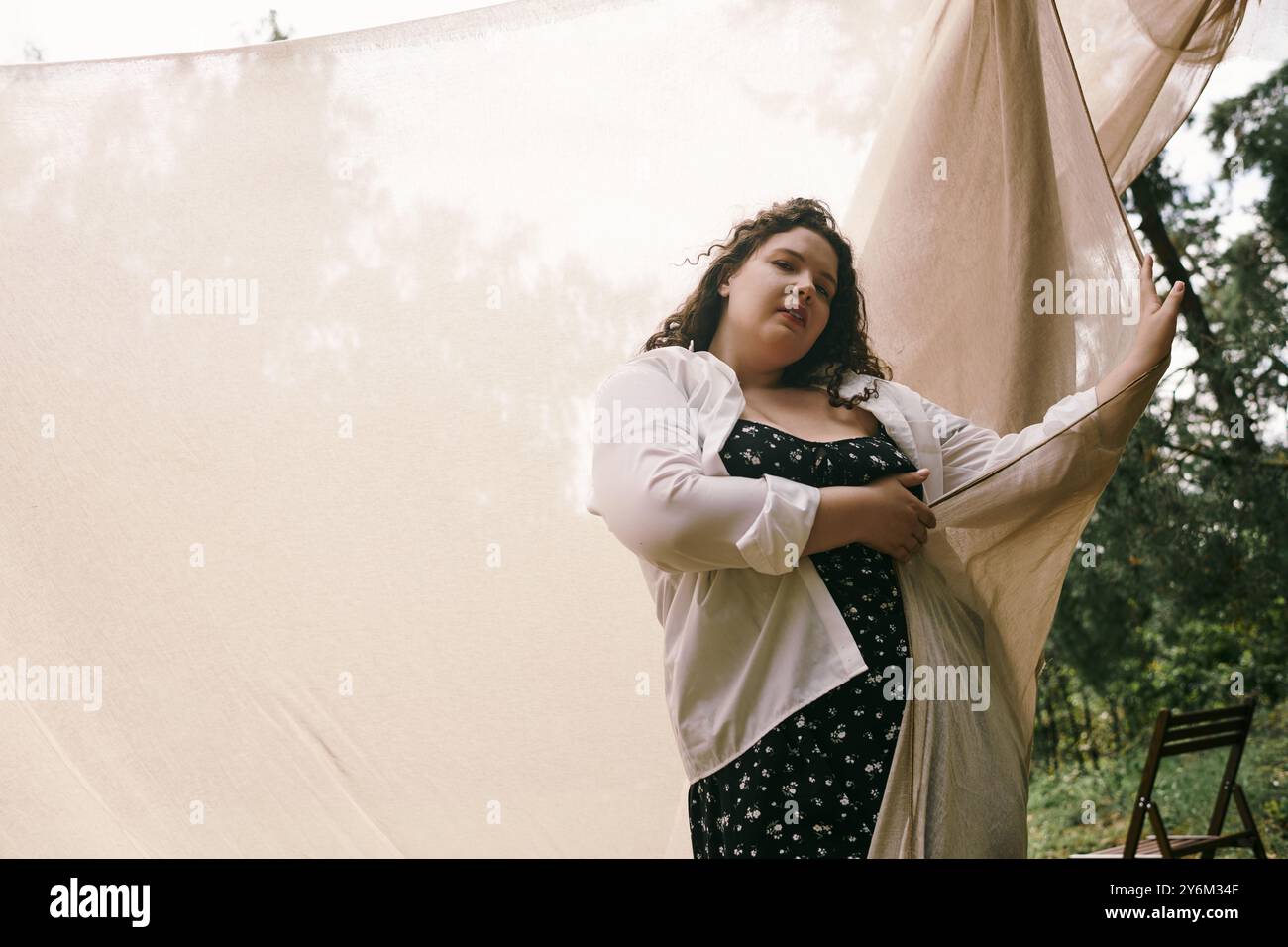 Flowing garment stands hi-res stock photography and images - Alamy