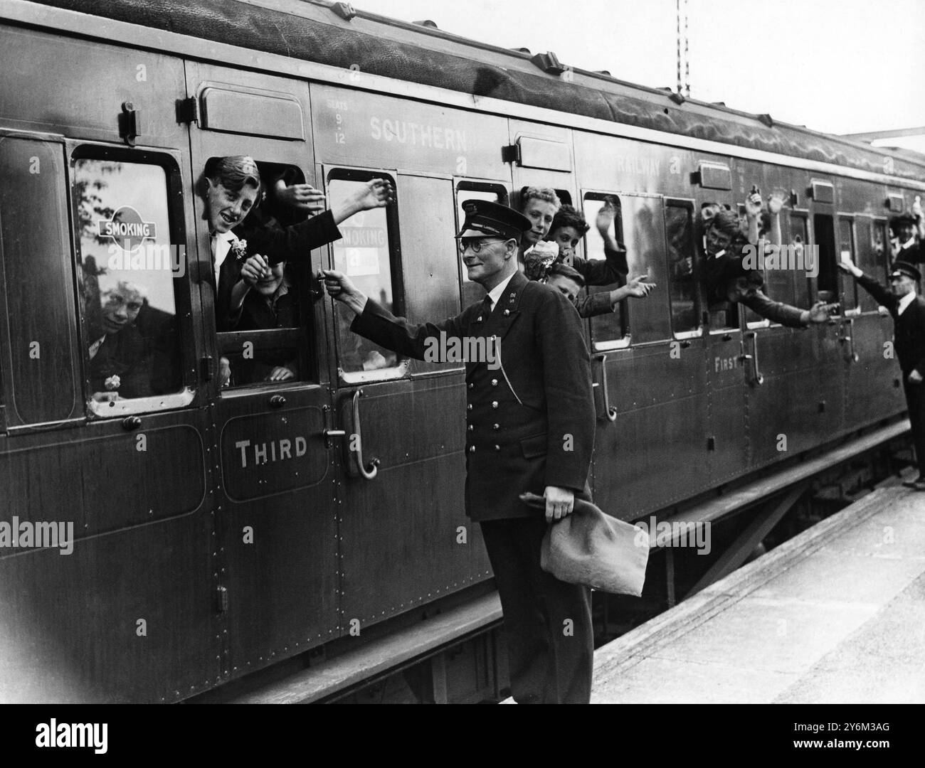 Children waving as the train leaves the Station Stock Photo - Alamy