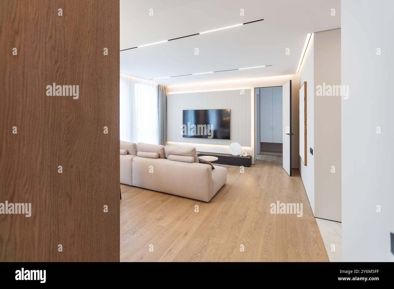 Top view of livingroom interior with large modular sofa, two armchairs ...