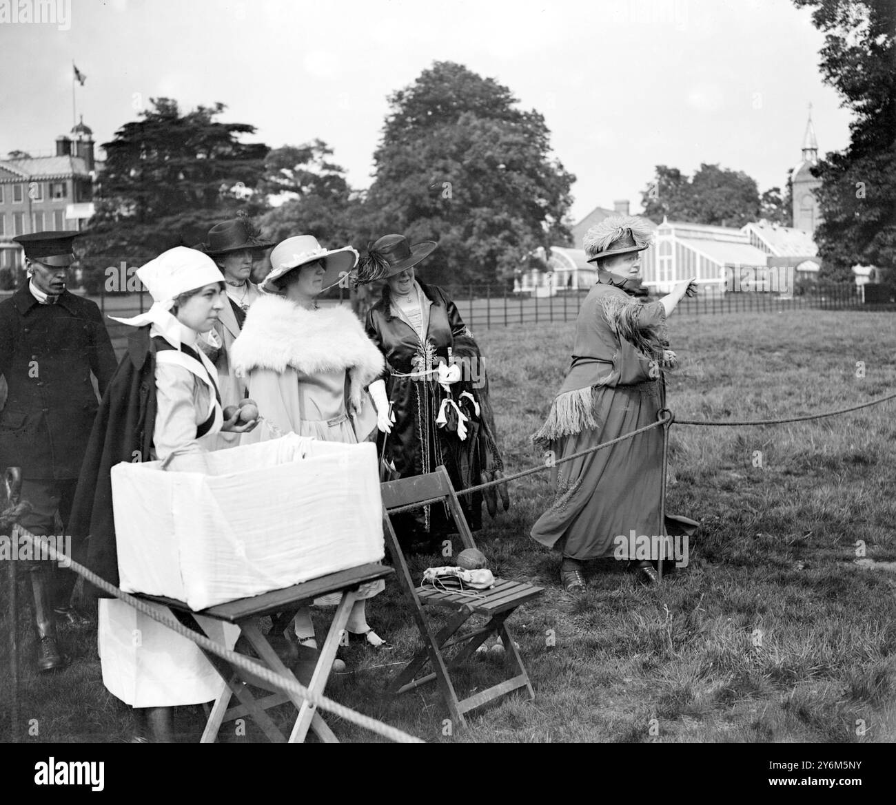Throwing coconuts Black and White Stock Photos & Images - Alamy