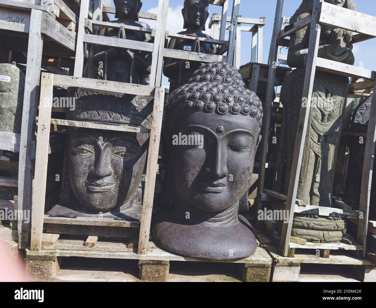 Sale of oriental Zen statue in a garden center Stock Photo - Alamy
