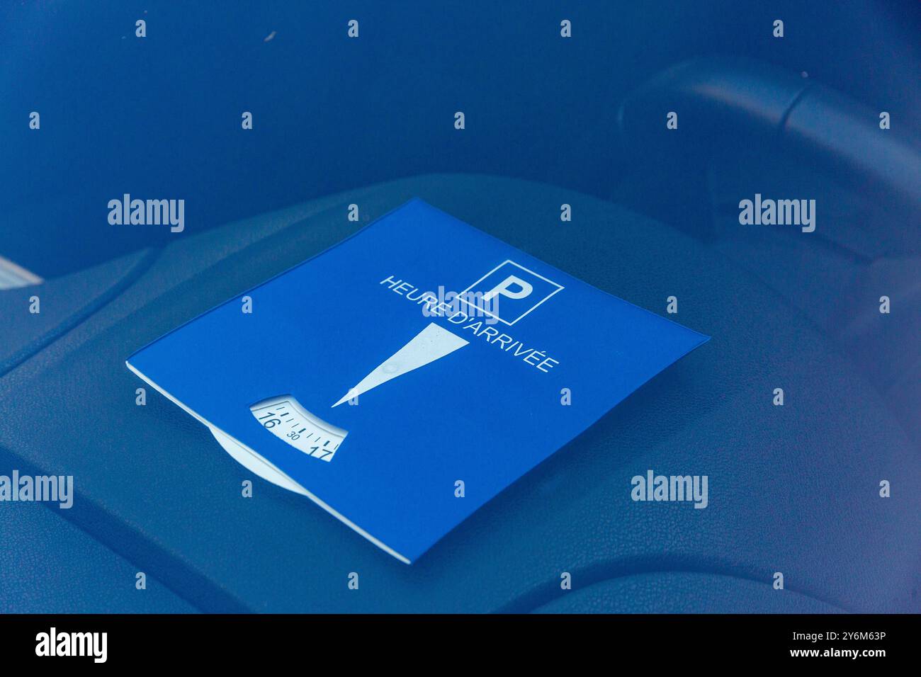 Parking disc for parking in the blue zone Stock Photo - Alamy