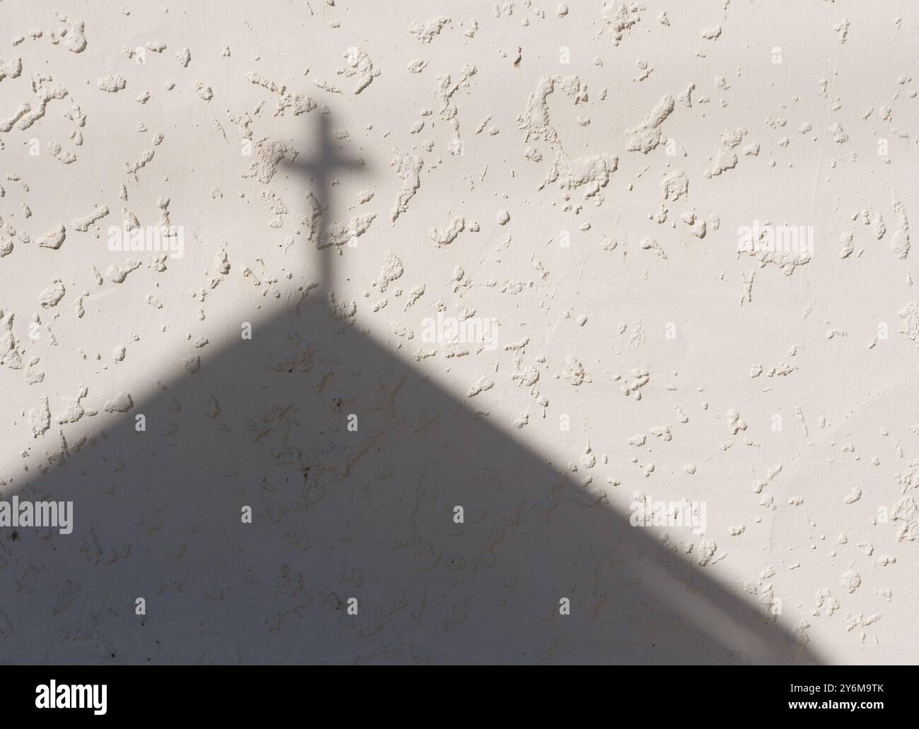 Shadow of triangular sign with cross cast on KI Anglican St Columbas ...