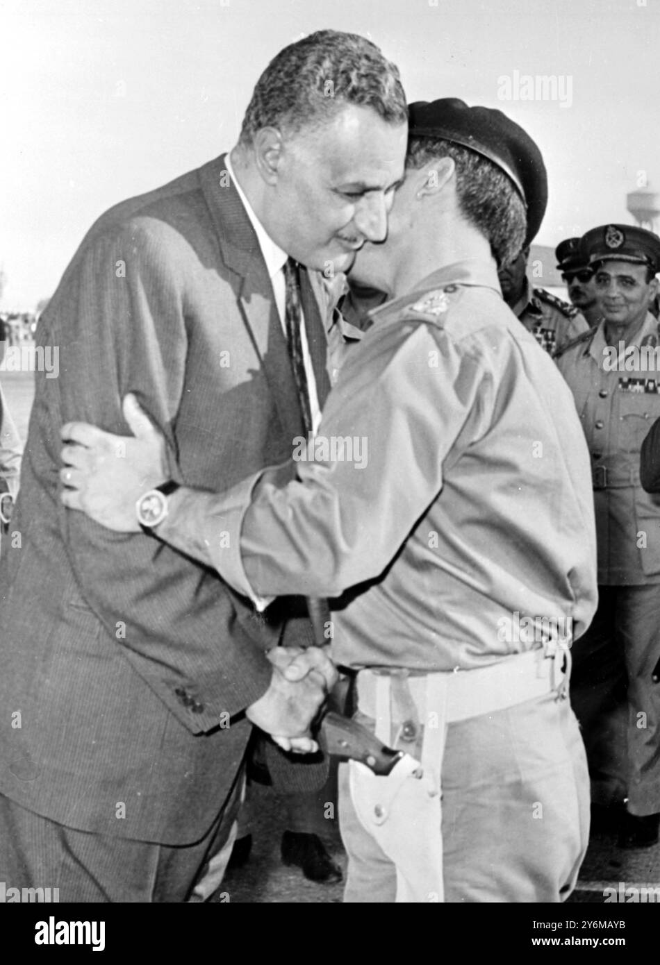 Cairo, U.A.R: Jordon's King Hussein, wearing a .38 revolver in cross ...