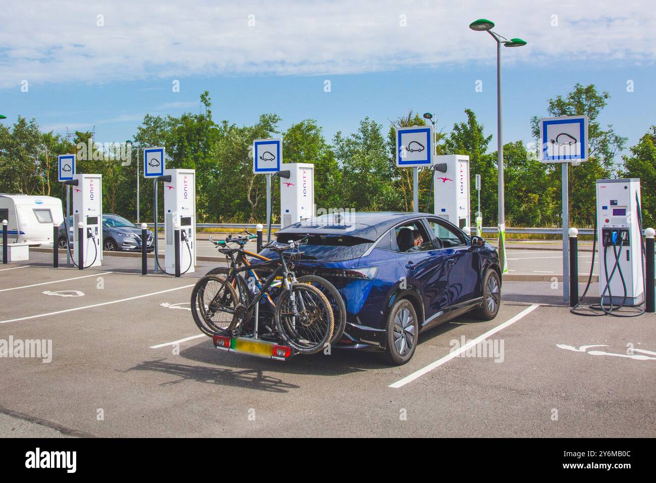 Ionity electric car charging station on a motorway rest area Stock Photo - Alamy