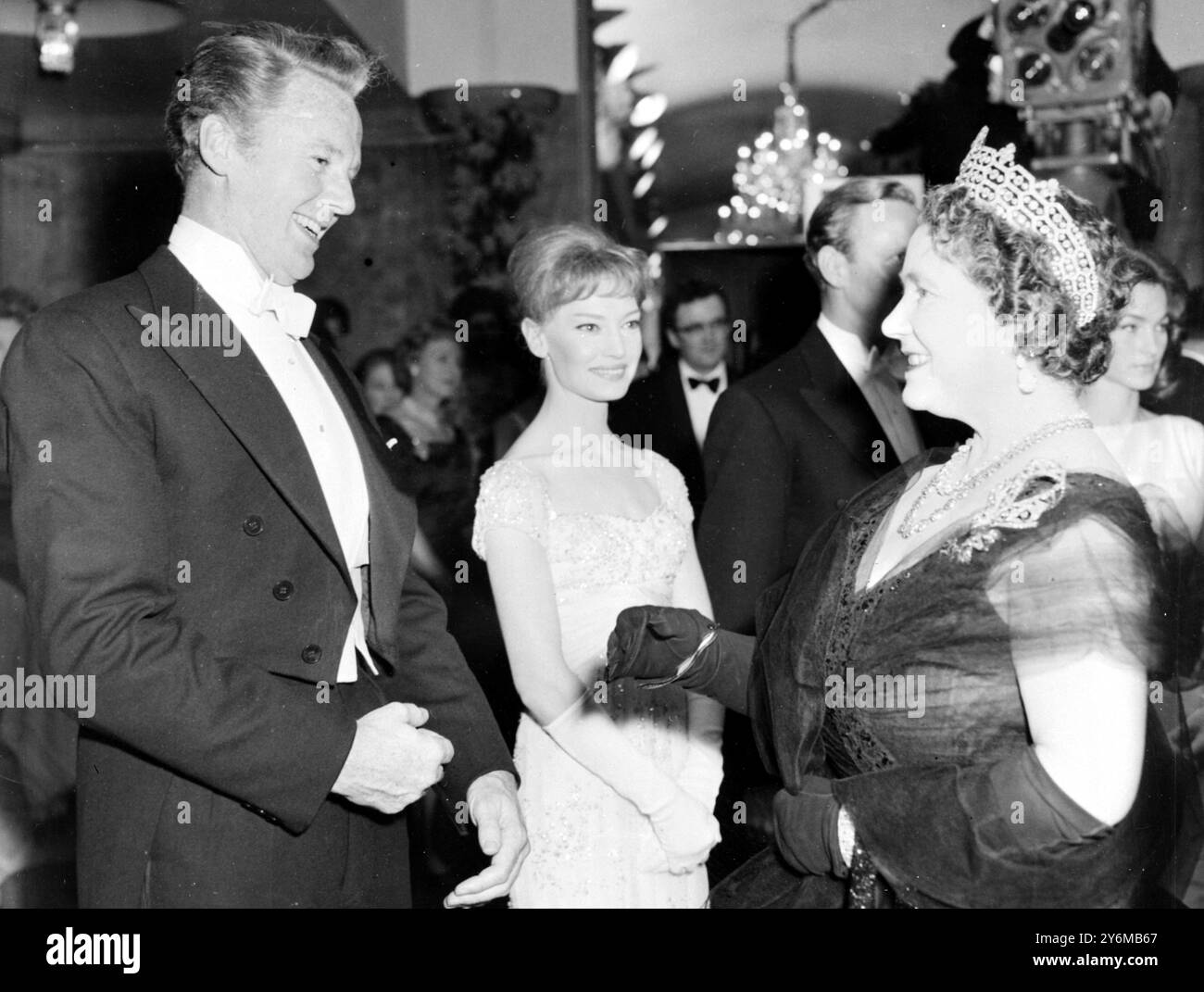 London: Queen Elizabeth the Queen Mother talks to film star Van Johnson ...