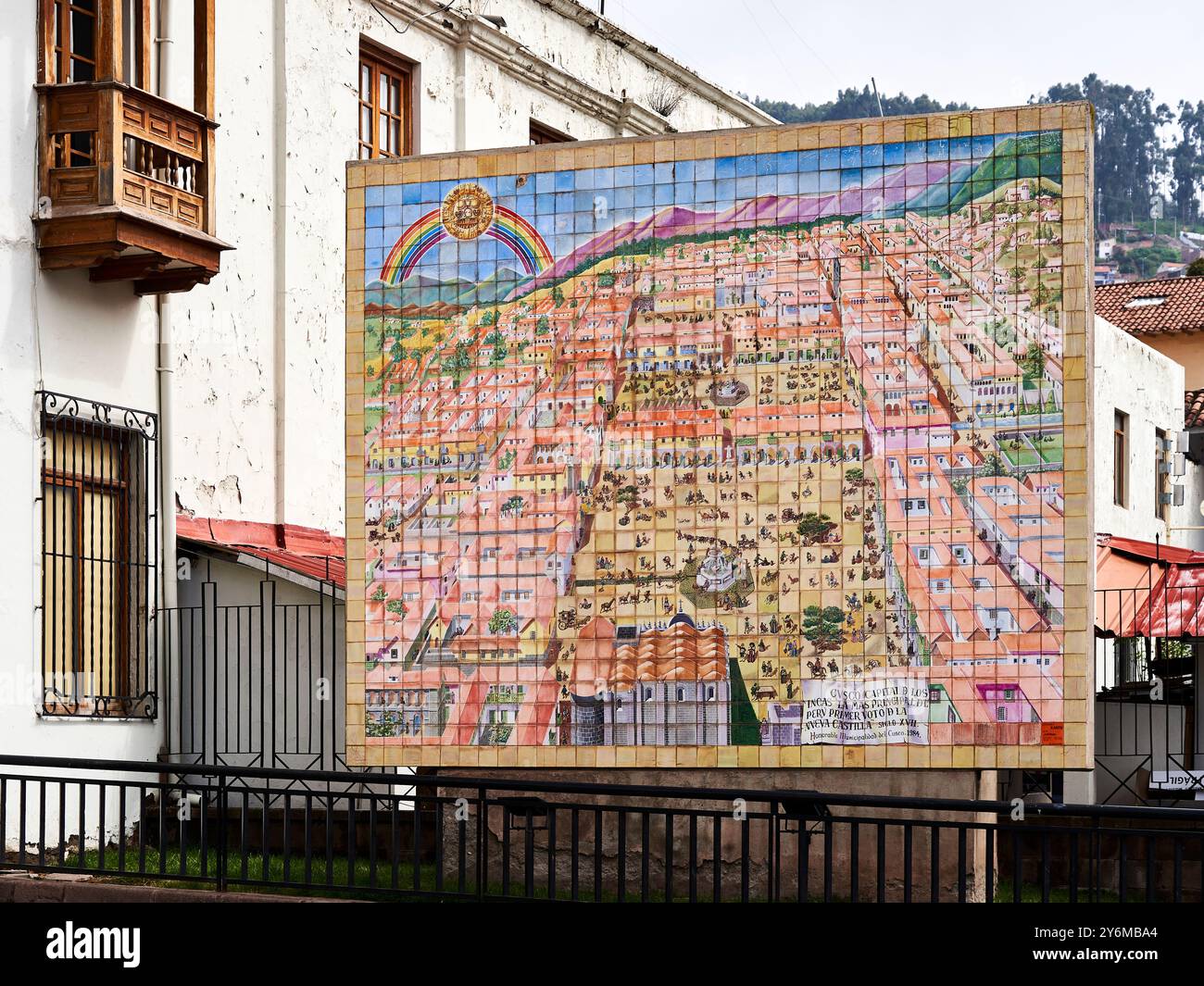 A vibrant mural depicting the cityscape of Cusco, Peru, set against a ...