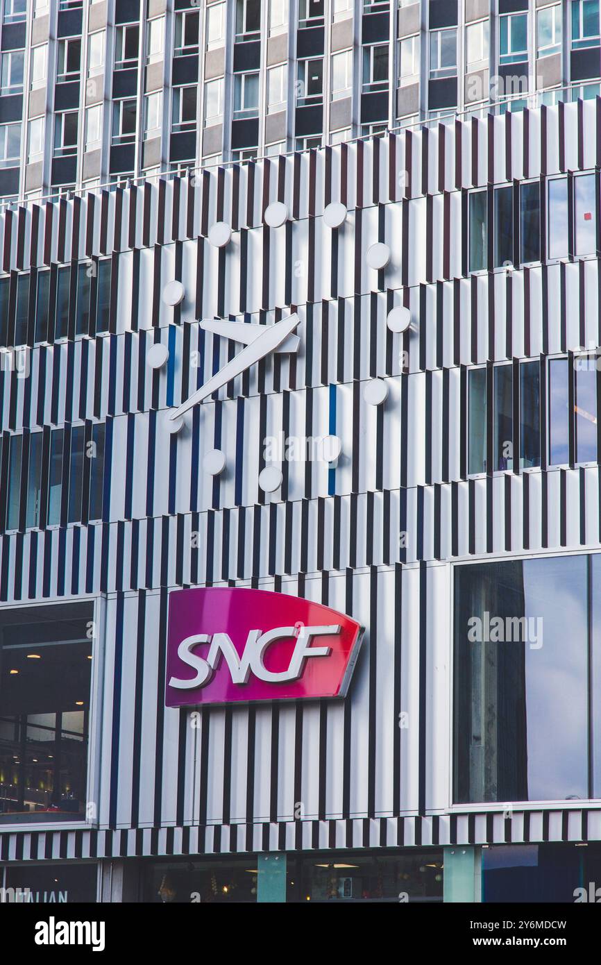 France, Paris, Montparnasse railway station, Clock and SNCF logo on the ...