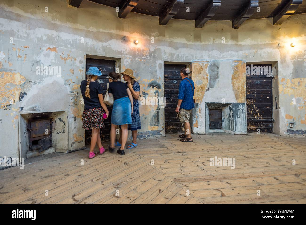 Visitors to the Landskrona Film Festival look through the peephole into ...