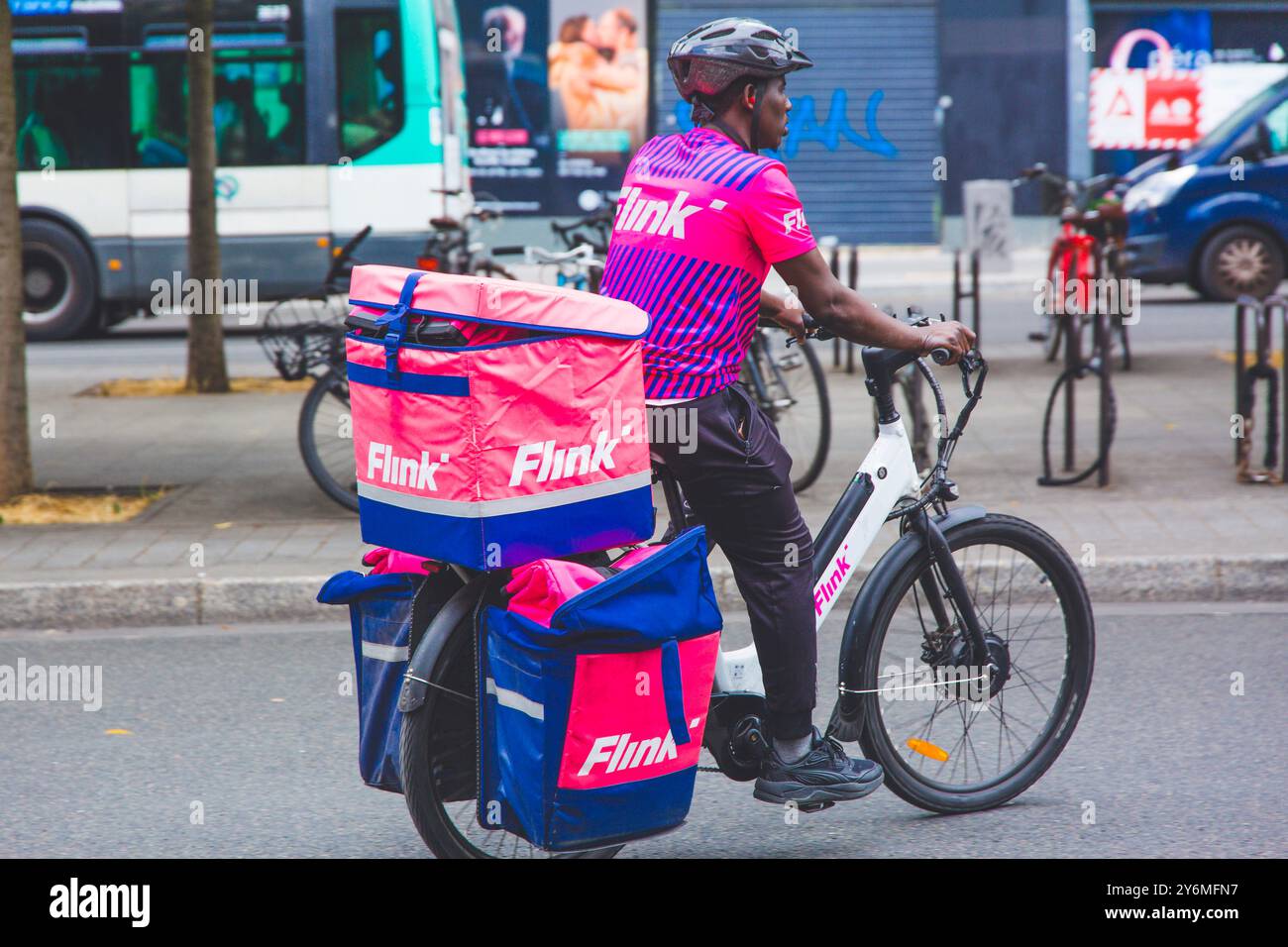 France, Paris. Delivery person from Flink Stock Photo - Alamy