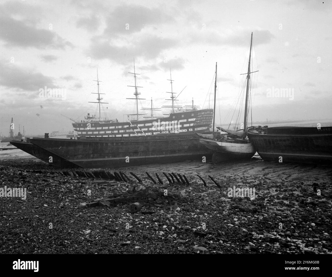 Shipping run aground on the shore in front of HMS Worcester on the ...