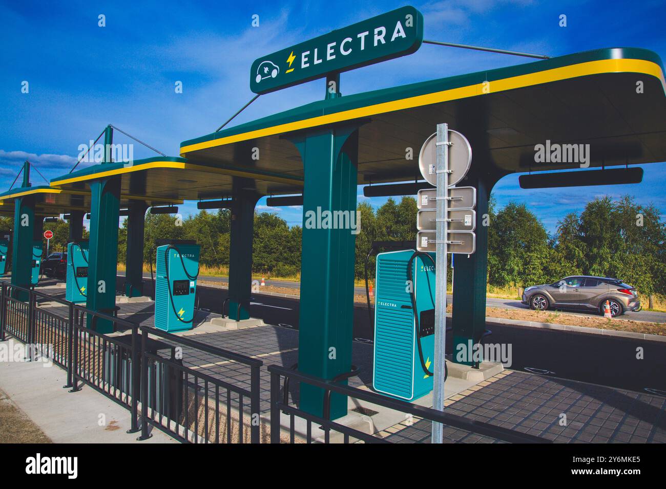 Electric car charging station on a motorway rest area. Electra Stock ...