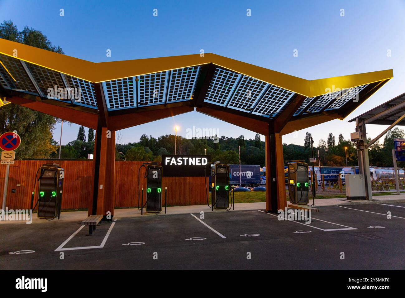 Electric car charging station on a motorway rest area. Fastned Stock ...