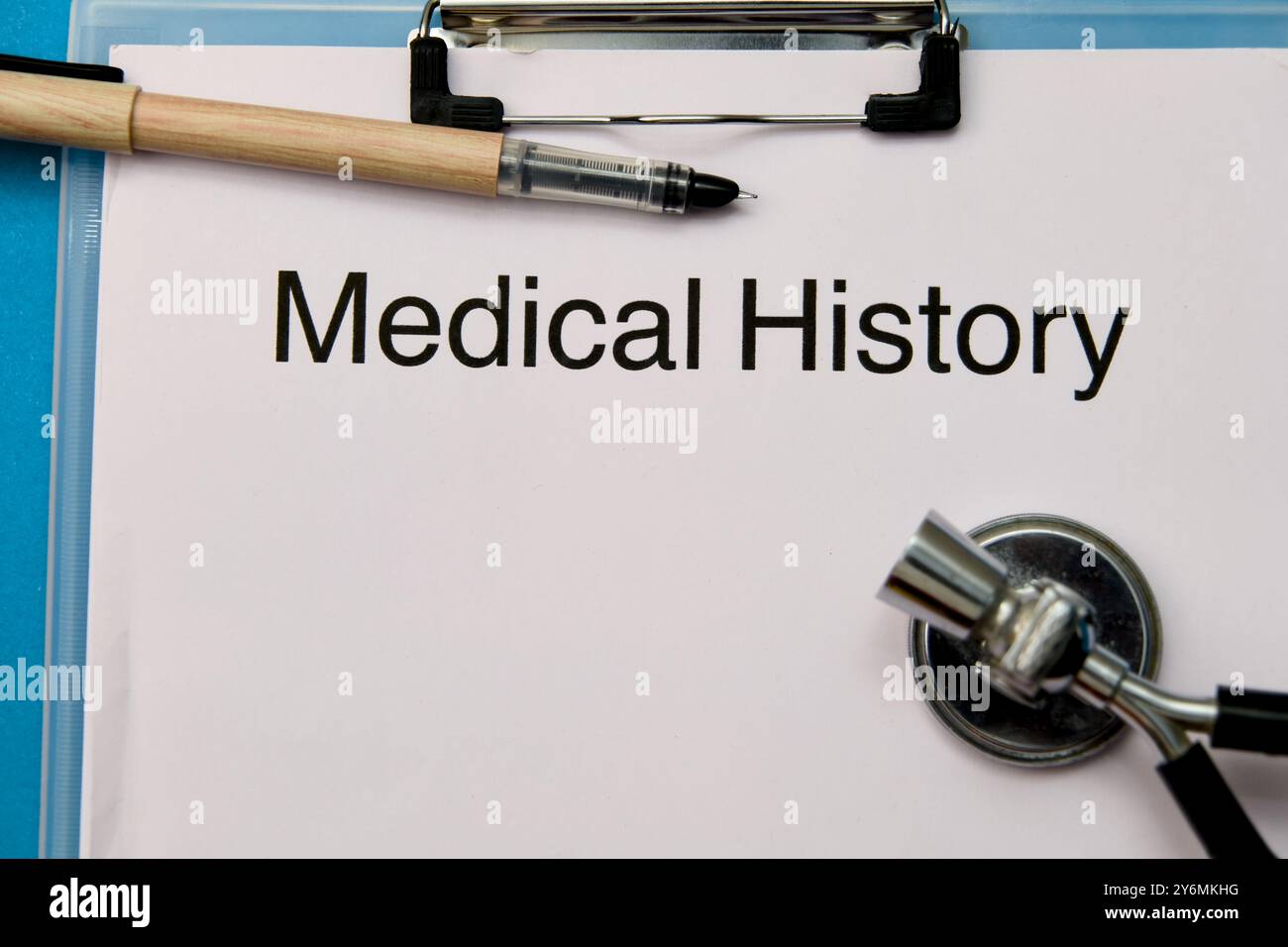 Blank medical history form on clipboard with pen and stethoscope, ready ...