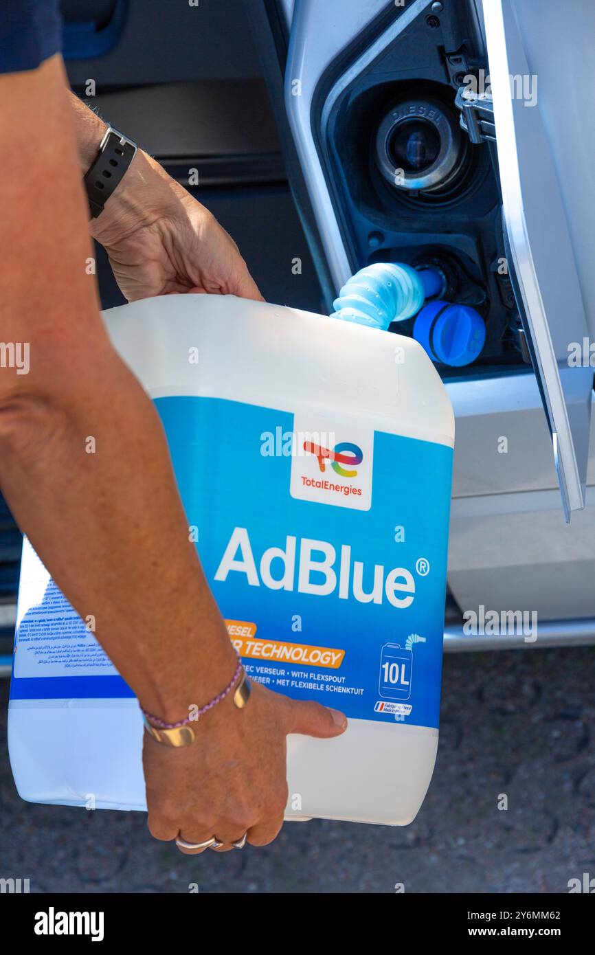 Loading AdBlue into a vehicle Stock Photo - Alamy