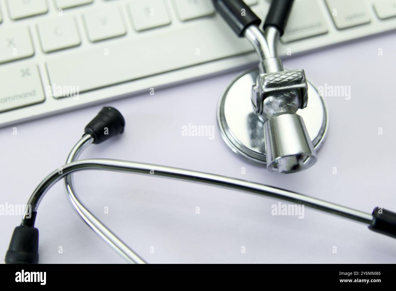 Stethoscope resting on a keyboard, symbolizing the rise of online ...