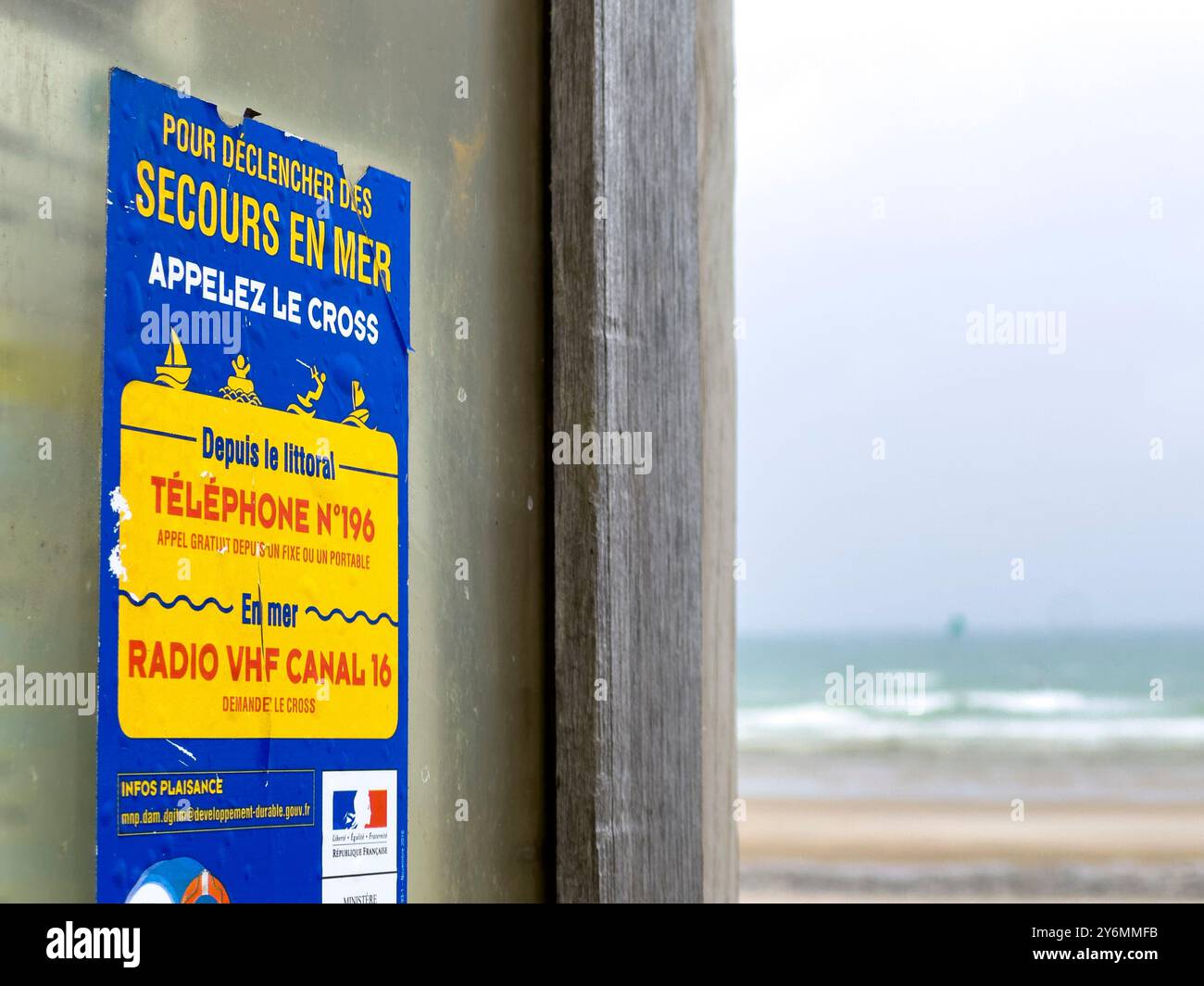 Sticker recalling the emergency number to call the Cross. In the ...