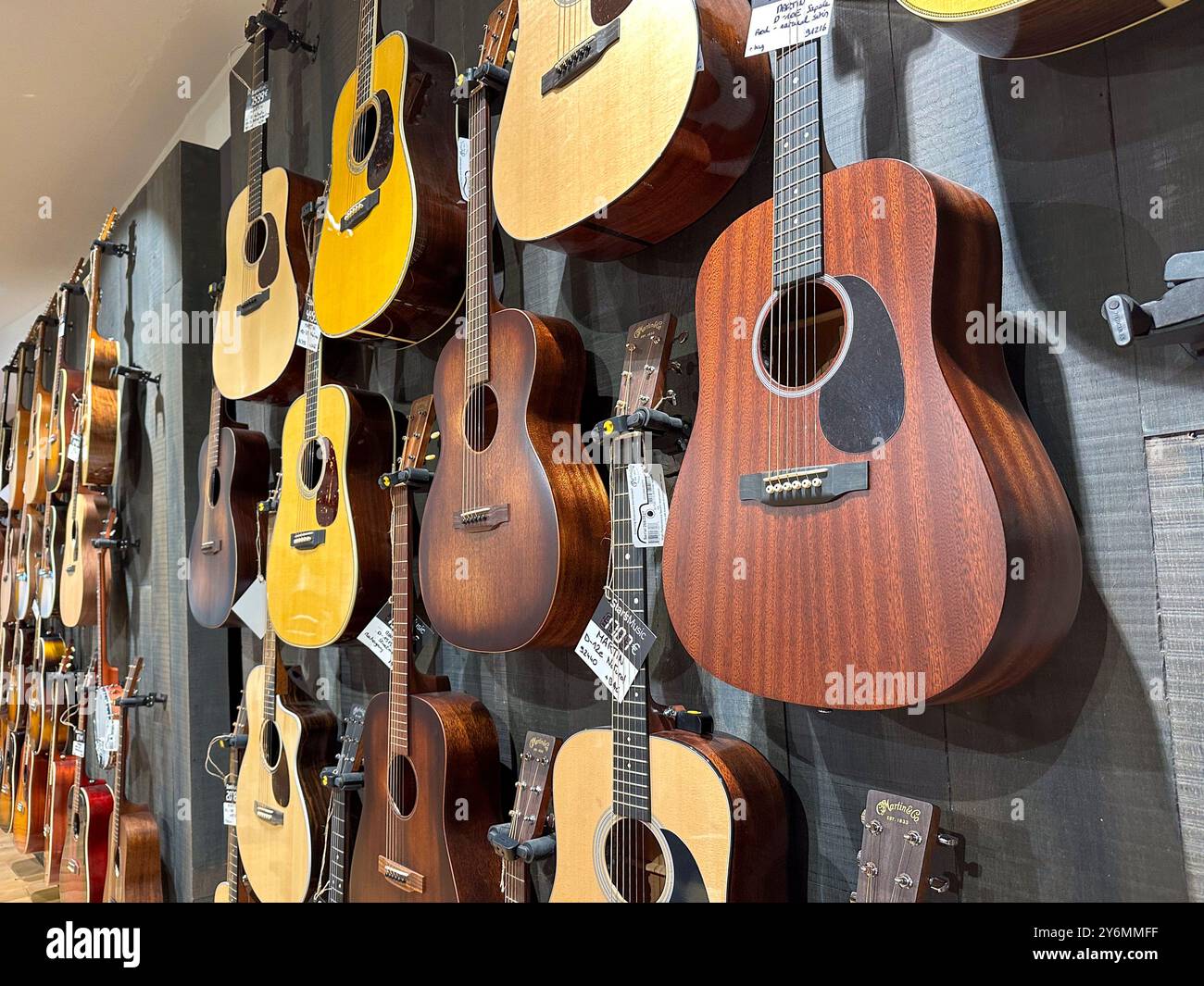 Music store, guitars Stock Photo - Alamy