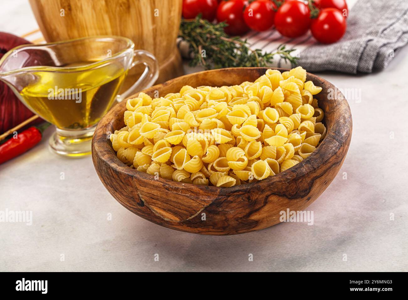Italian cuisine - dry conchiglie shell pasta Stock Photo - Alamy