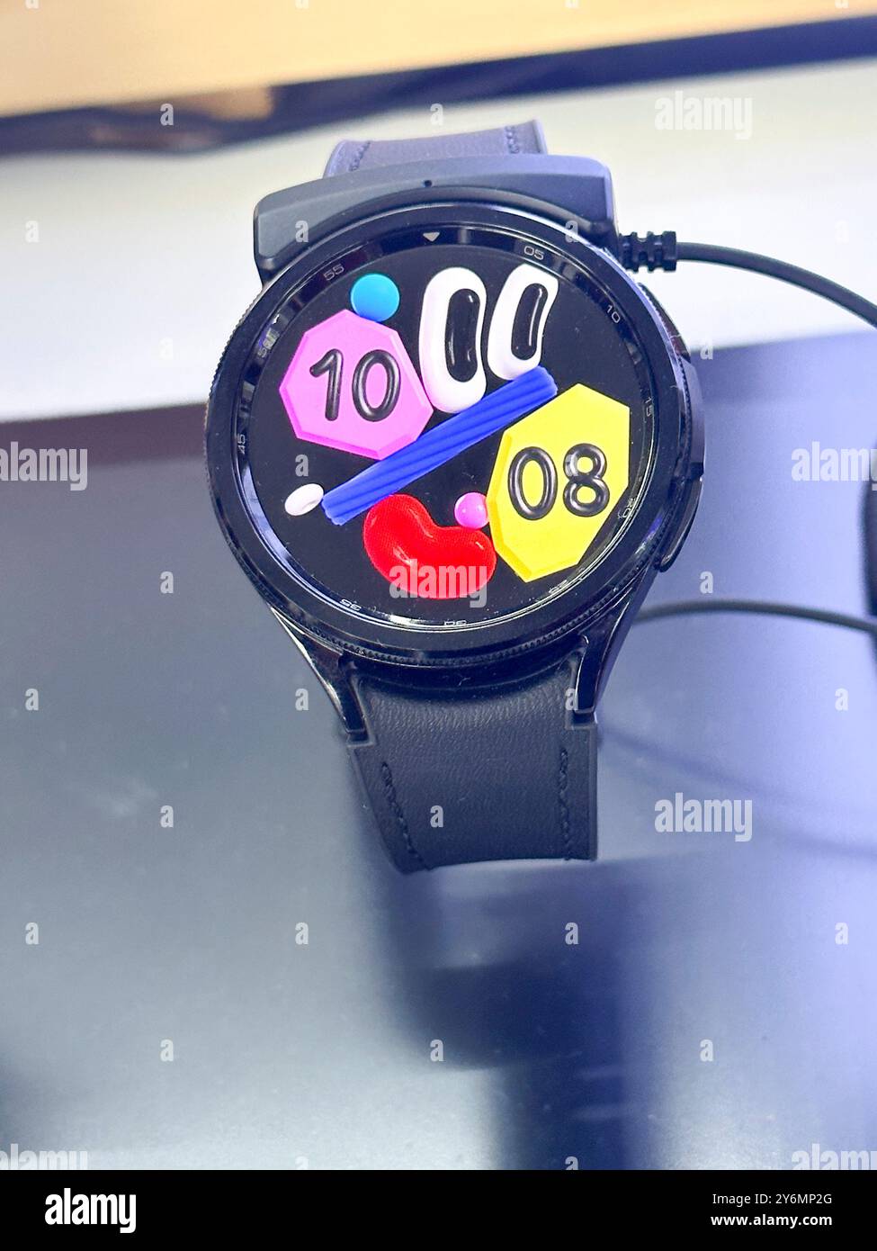 Shelf displaying a connected watch in a supermarket. Samsung, Galaxy ...