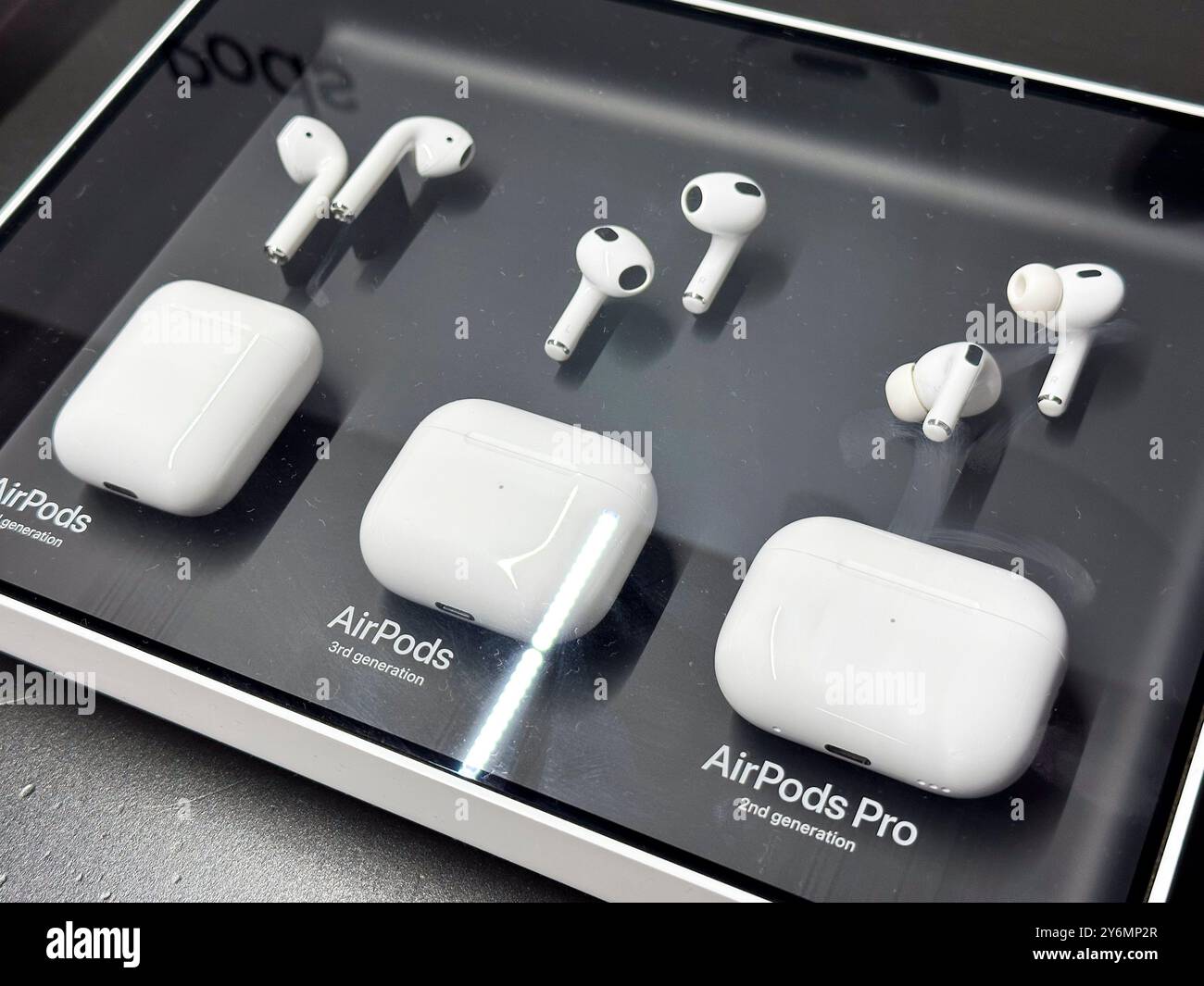 Different AirPods models in one box Stock Photo - Alamy
